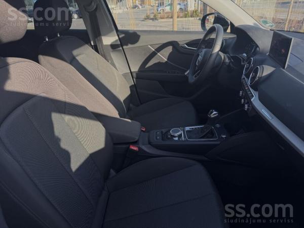Black Audi Q2 2023 in Riga, with an engine capacity of 1.50 L and mileage of 41 thousand km for 20700 €, photo 8 on AUTOMOTO.COM.LV