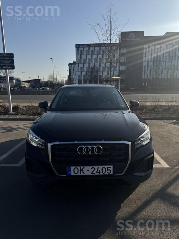 Black Audi Q2 2023 in Riga, with an engine capacity of 1.50 L and mileage of 41 thousand km for 19800 €, photo 1 on AUTOMOTO.COM.LV