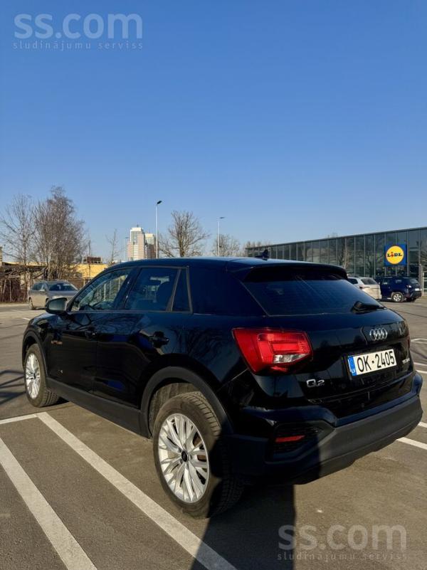 Black Audi Q2 2023 in Riga, with an engine capacity of 1.50 L and mileage of 41 thousand km for 19800 €, photo 4 on AUTOMOTO.COM.LV