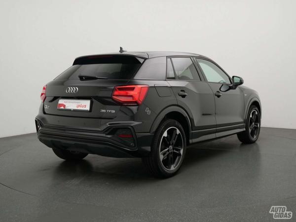 Black Audi Q2 2024 in Kaunas, with an engine capacity of 1.50 L and mileage of 19 thousand km for 32679 €, photo 2 on AUTOMOTO.COM.LV