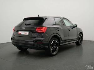 Black Audi Q2 2024 in Kaunas, with an engine capacity of 1.50 L and mileage of 19 thousand km for 32679 €, photo 2 on AUTOMOTO.COM.LV