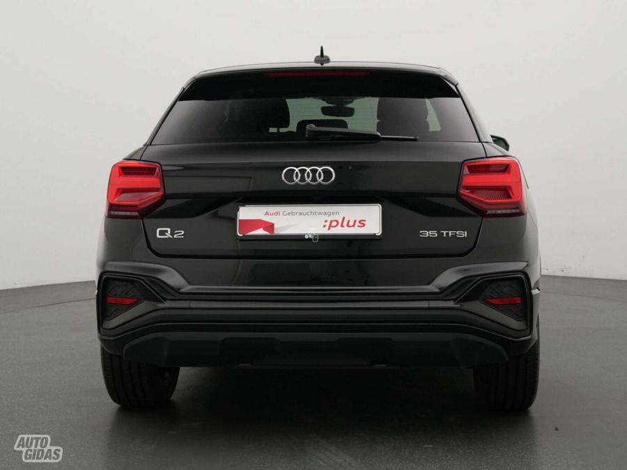 Black Audi Q2 2024 in Kaunas, with an engine capacity of 1.50 L and mileage of 19 thousand km for 32679 €, photo 4 on AUTOMOTO.COM.LV
