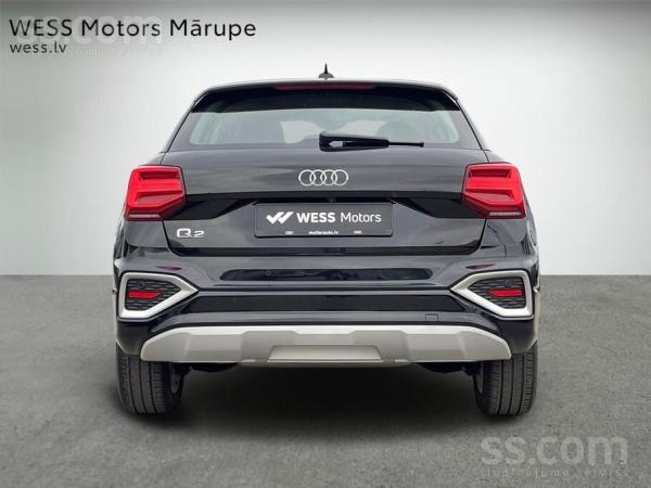 Black Audi Q2 2024 in Riga, with an engine capacity of 1.50 L and mileage of 82 thousand km for 22990 €, photo 4 on AUTOMOTO.COM.LV