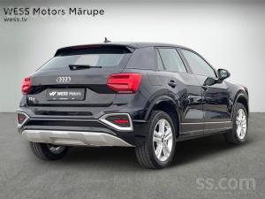 Black Audi Q2 2024 in Riga, with an engine capacity of 1.50 L and mileage of 82 thousand km for 22990 €, photo 3 on AUTOMOTO.COM.LV