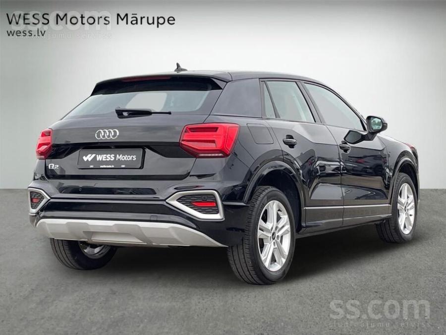 Black Audi Q2 2024 in Riga, with an engine capacity of 1.50 L and mileage of 82 thousand km for 22990 €, photo 3 on AUTOMOTO.COM.LV