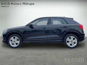 Black Audi Q2 2024 in Riga, with an engine capacity of 1.50 L and mileage of 82 thousand km for 22990 €, photo 4 on AUTOMOTO.COM.LV