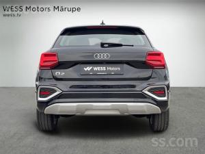 Black Audi Q2 2024 in Riga, with an engine capacity of 1.50 L and mileage of 82 thousand km for 22990 €, photo 5 on AUTOMOTO.COM.LV