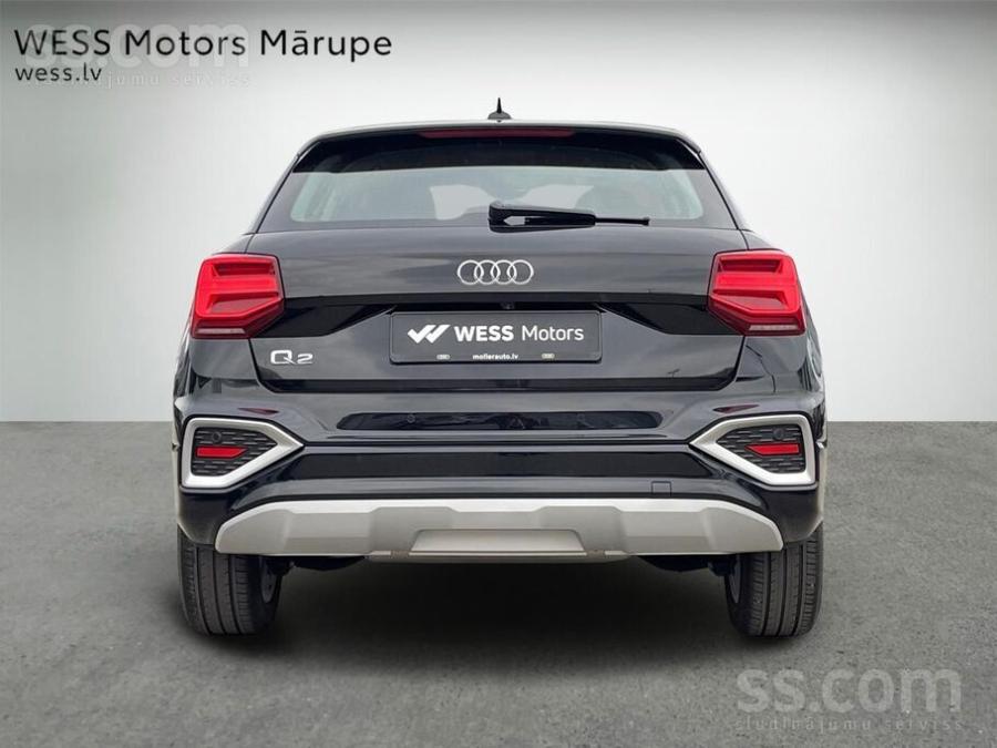 Black Audi Q2 2024 in Riga, with an engine capacity of 1.50 L and mileage of 82 thousand km for 22990 €, photo 5 on AUTOMOTO.COM.LV