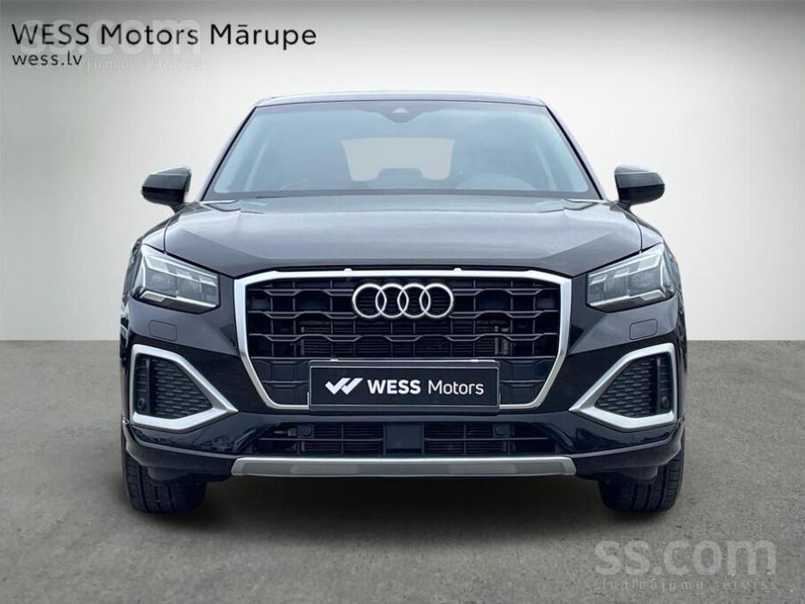 Black Audi Q2 2024 in Riga, with an engine capacity of 1.50 L and mileage of 82 thousand km for 22990 €, photo 6 on AUTOMOTO.COM.LV