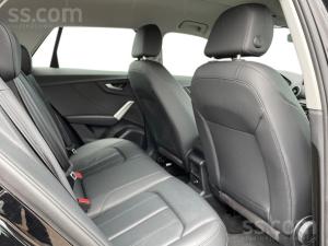 Black Audi Q2 2024 in Riga, with an engine capacity of 1.50 L and mileage of 82 thousand km for 22990 €, photo 8 on AUTOMOTO.COM.LV