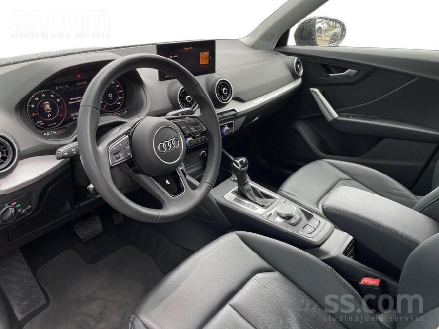 Black Audi Q2 2024 in Riga, with an engine capacity of 1.50 L and mileage of 82 thousand km for 22990 €, photo 12 on AUTOMOTO.COM.LV