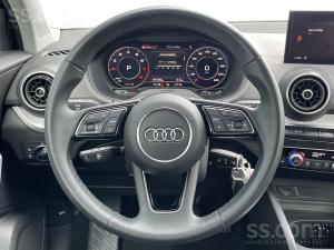 Black Audi Q2 2024 in Riga, with an engine capacity of 1.50 L and mileage of 82 thousand km for 22990 €, photo 13 on AUTOMOTO.COM.LV