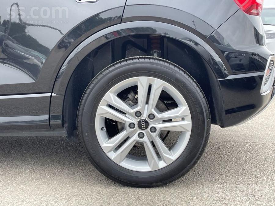 Black Audi Q2 2024 in Riga, with an engine capacity of 1.50 L and mileage of 82 thousand km for 22990 €, photo 16 on AUTOMOTO.COM.LV