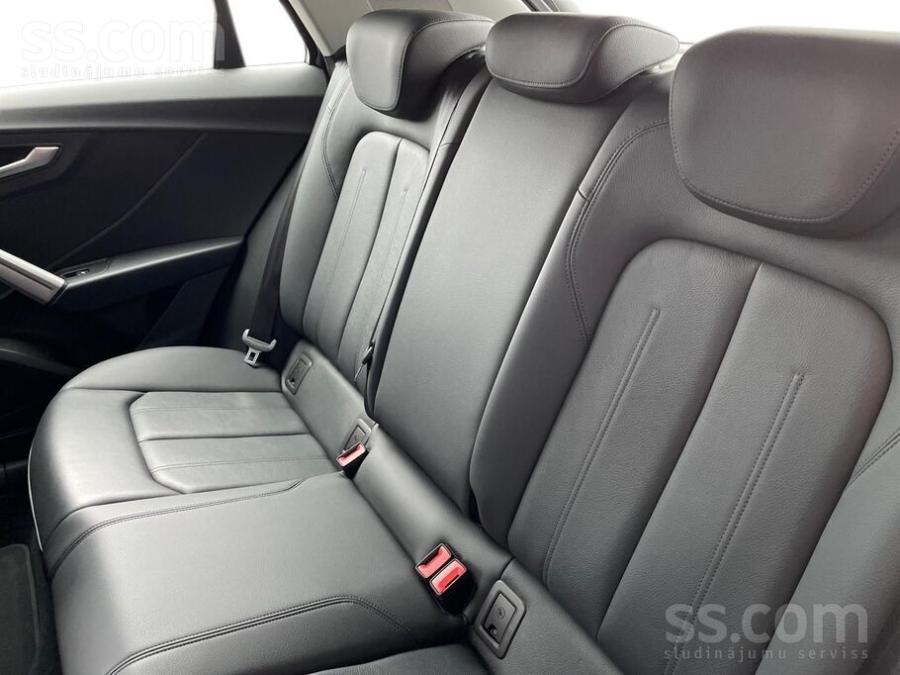 Black Audi Q2 2024 in Riga, with an engine capacity of 1.50 L and mileage of 82 thousand km for 22990 €, photo 20 on AUTOMOTO.COM.LV