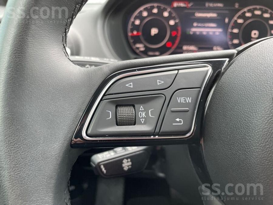Black Audi Q2 2024 in Riga, with an engine capacity of 1.50 L and mileage of 82 thousand km for 22990 €, photo 22 on AUTOMOTO.COM.LV
