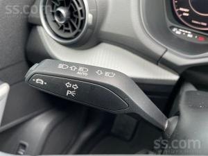 Black Audi Q2 2024 in Riga, with an engine capacity of 1.50 L and mileage of 82 thousand km for 22990 €, photo 24 on AUTOMOTO.COM.LV