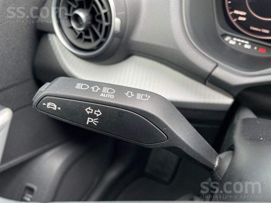 Black Audi Q2 2024 in Riga, with an engine capacity of 1.50 L and mileage of 82 thousand km for 22990 €, photo 24 on AUTOMOTO.COM.LV