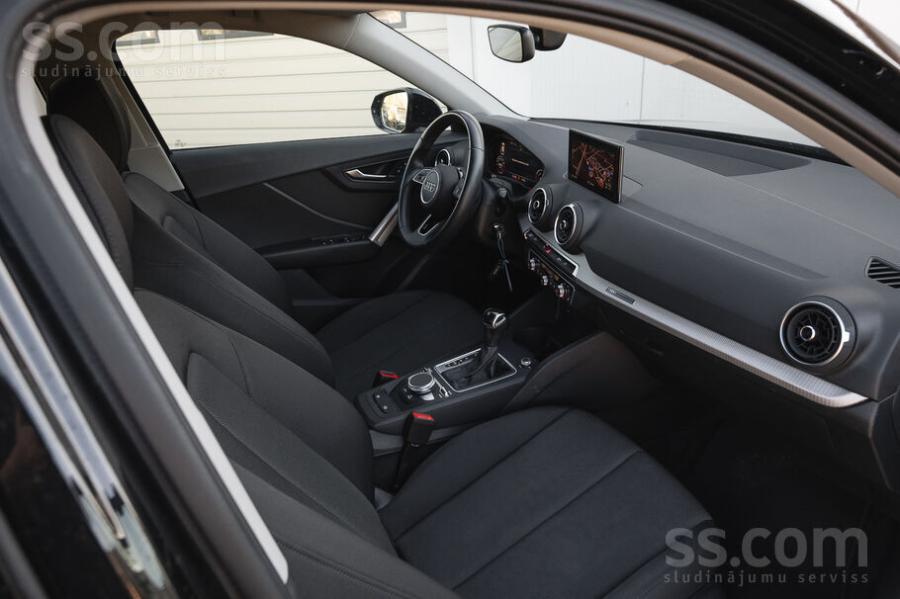 Black Audi Q2 2022 in Jelgava, with an engine capacity of 1.50 L and mileage of 56 thousand km for 20900 €, photo 10 on AUTOMOTO.COM.LV