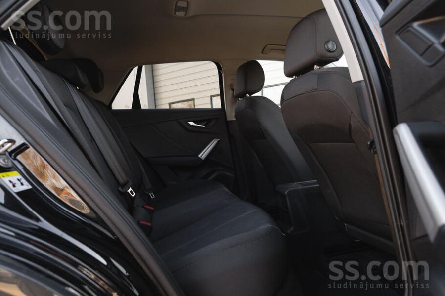 Black Audi Q2 2022 in Jelgava, with an engine capacity of 1.50 L and mileage of 56 thousand km for 20900 €, photo 11 on AUTOMOTO.COM.LV