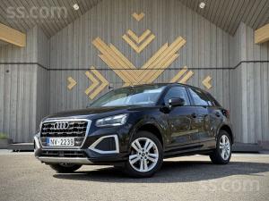 Black Audi Q2 2024 in Riga, with an engine capacity of 1.50 L and mileage of 76 thousand km for 22300 €, photo  on AUTOMOTO.COM.LV