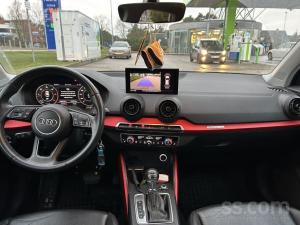 Grey Audi Q2 2017 in Cesis, with an engine capacity of 2.00 L and mileage of 241 thousand km for 15500 €, photo 8 on AUTOMOTO.COM.LV