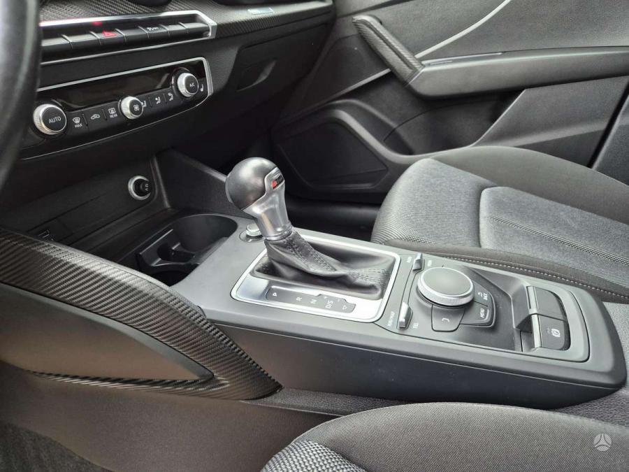 Grey Audi Q2 2017 in Utena, with an engine capacity of 1.40 L and mileage of 247 thousand km for 12490 €, photo 15 on AUTOMOTO.COM.LV