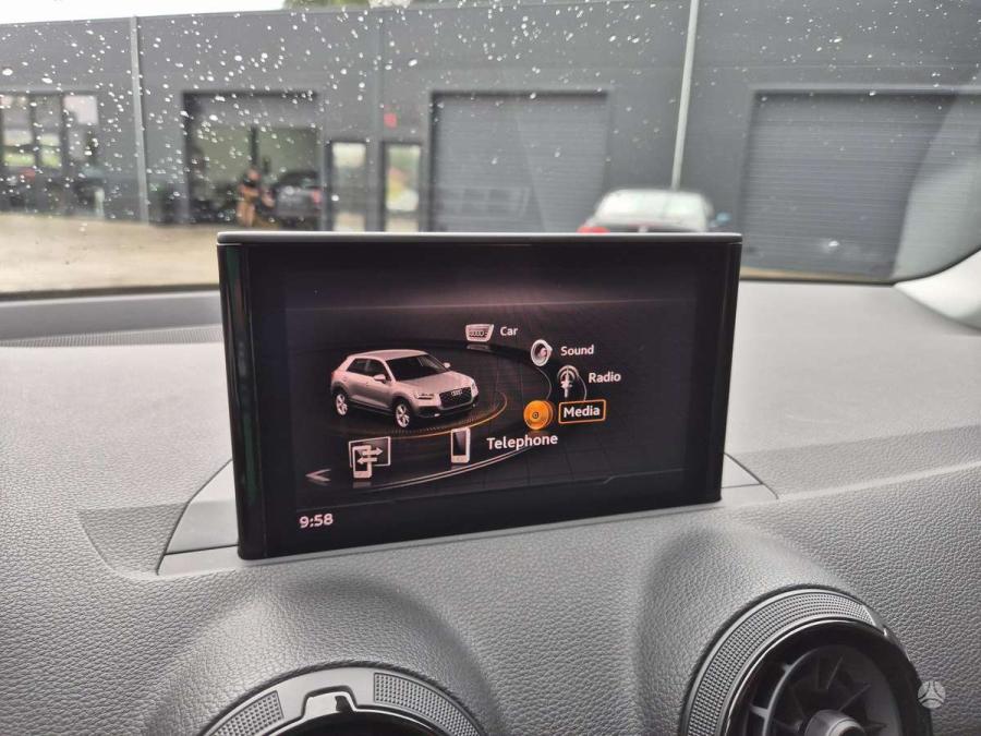 Grey Audi Q2 2017 in Utena, with an engine capacity of 1.40 L and mileage of 247 thousand km for 12490 €, photo 18 on AUTOMOTO.COM.LV
