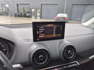 Grey Audi Q2 2017 in Utena, with an engine capacity of 1.40 L and mileage of 247 thousand km for 12490 €, photo 20 on AUTOMOTO.COM.LV