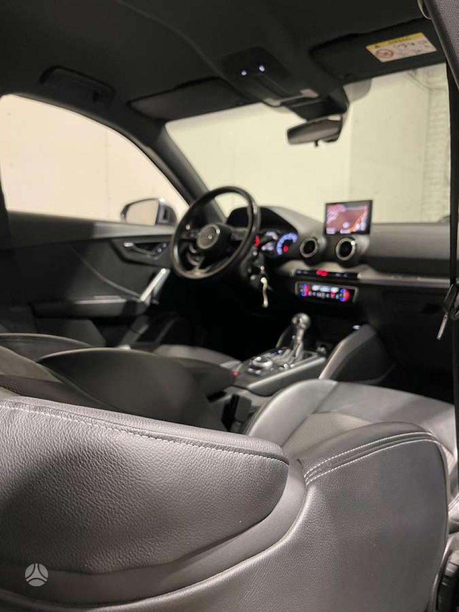 Grey Audi Q2 2017 in Klaipeda, with an engine capacity of 1.40 L and mileage of 209 thousand km for 14999 €, photo 3 on AUTOMOTO.COM.LV