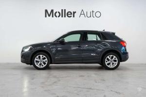Grey Audi Q2 2021 in Vilnius, with an engine capacity of 1.50 L and mileage of 90 thousand km for 17900 €, photo 3 on AUTOMOTO.COM.LV