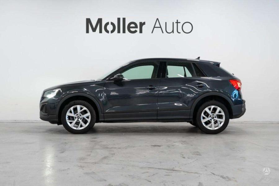 Grey Audi Q2 2021 in Vilnius, with an engine capacity of 1.50 L and mileage of 90 thousand km for 17900 €, photo 3 on AUTOMOTO.COM.LV