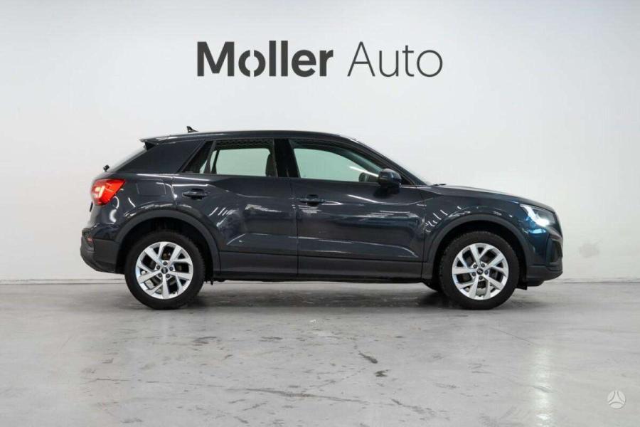 Grey Audi Q2 2021 in Vilnius, with an engine capacity of 1.50 L and mileage of 90 thousand km for 17900 €, photo 5 on AUTOMOTO.COM.LV