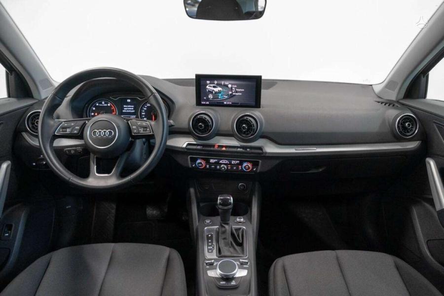 Grey Audi Q2 2021 in Vilnius, with an engine capacity of 1.50 L and mileage of 90 thousand km for 17900 €, photo 10 on AUTOMOTO.COM.LV