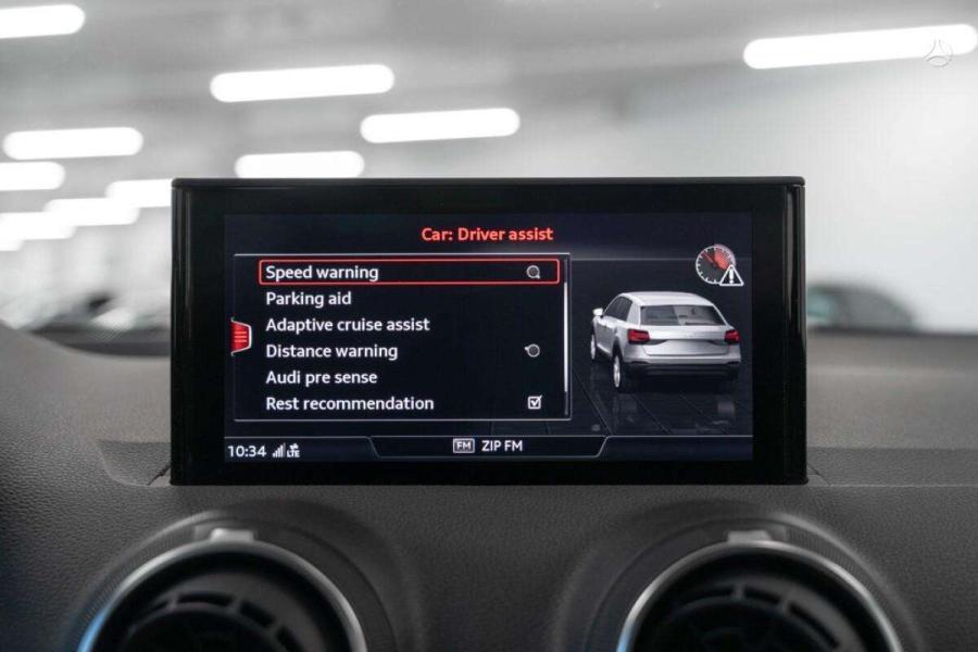 Grey Audi Q2 2021 in Vilnius, with an engine capacity of 1.50 L and mileage of 90 thousand km for 17900 €, photo 14 on AUTOMOTO.COM.LV