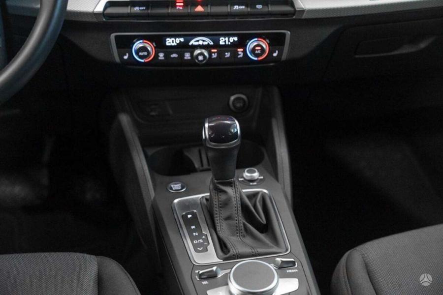 Grey Audi Q2 2021 in Vilnius, with an engine capacity of 1.50 L and mileage of 90 thousand km for 17900 €, photo 18 on AUTOMOTO.COM.LV
