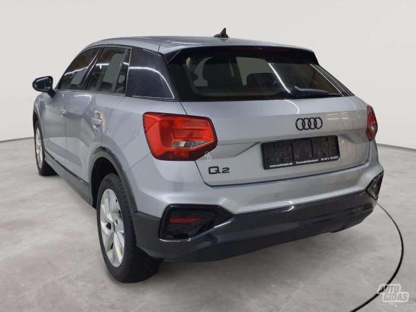 Grey Audi Q2 2023 in Kaunas, with an engine capacity of 1.50 L and mileage of 61 thousand km for 24450 €, photo 2 on AUTOMOTO.COM.LV