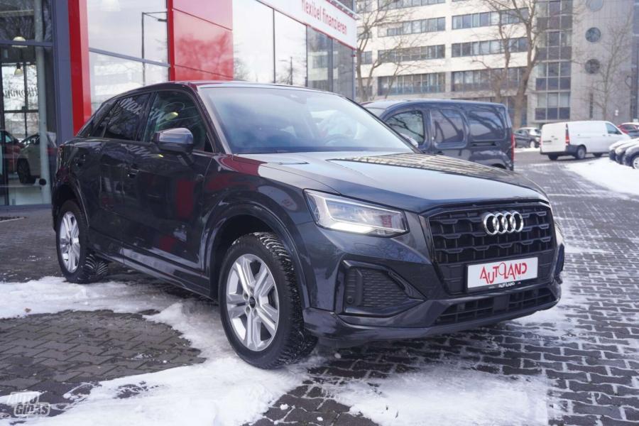 Grey Audi Q2 2023 in Kaunas, with an engine capacity of 1.50 L and mileage of 98 thousand km for 25995 €, photo 4 on AUTOMOTO.COM.LV