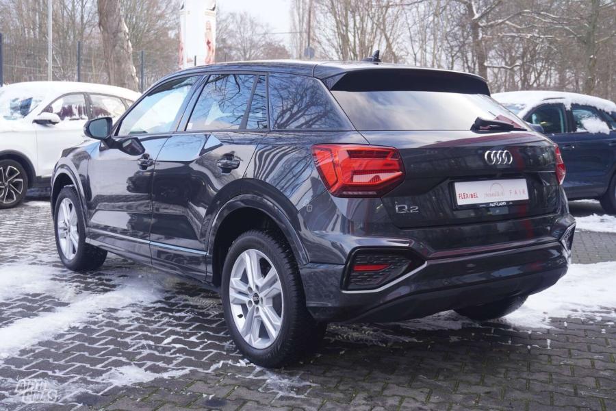 Grey Audi Q2 2023 in Kaunas, with an engine capacity of 1.50 L and mileage of 98 thousand km for 25995 €, photo 8 on AUTOMOTO.COM.LV