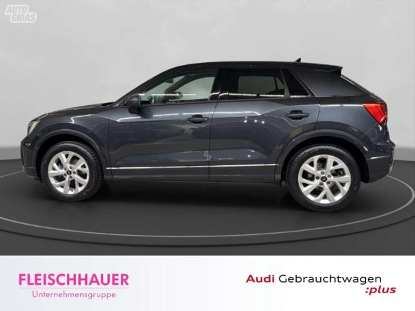 Grey Audi Q2 2024 in Kaunas, with an engine capacity of 1.50 L and mileage of 13 thousand km for 32690 €, photo 3 on AUTOMOTO.COM.LV