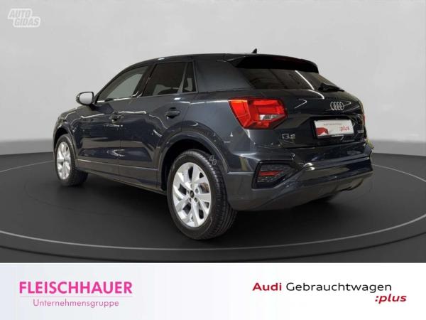 Grey Audi Q2 2024 in Kaunas, with an engine capacity of 1.50 L and mileage of 13 thousand km for 32690 €, photo 4 on AUTOMOTO.COM.LV