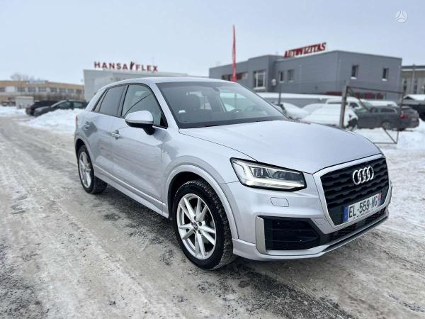 Grey Audi Q2 2017 in Panevezys, with an engine capacity of 1.40 L and mileage of 100 thousand km for 14700 €, photo 2 on AUTOMOTO.COM.LV