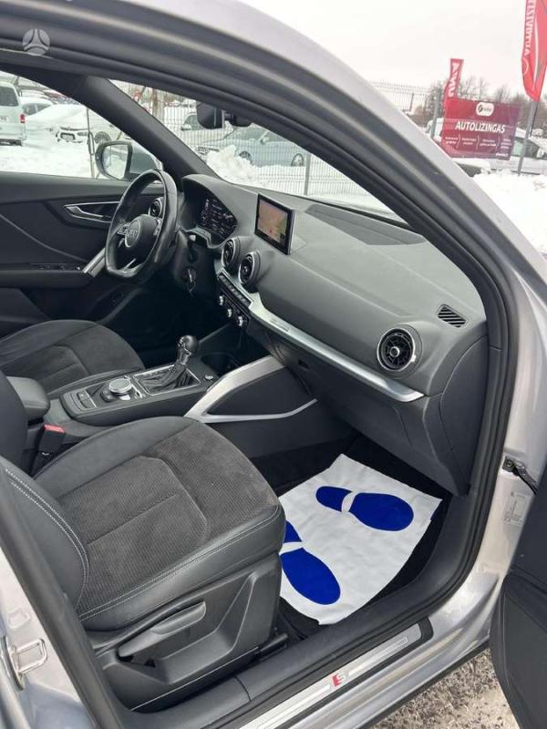 Grey Audi Q2 2017 in Panevezys, with an engine capacity of 1.40 L and mileage of 100 thousand km for 14700 €, photo 11 on AUTOMOTO.COM.LV
