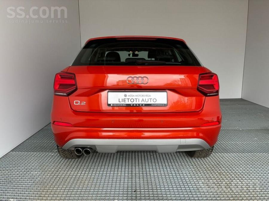 Orange Audi Q2 2017 in Riga, with an engine capacity of 1.40 L and mileage of 132 thousand km for 14990 €, photo 4 on AUTOMOTO.COM.LV