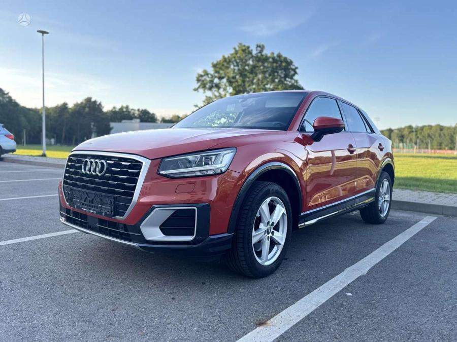 Orange Audi Q2 2017 in Kaunas, with an engine capacity of 1.60 L and mileage of 292 thousand km for 12800 €, photo 1 on AUTOMOTO.COM.LV