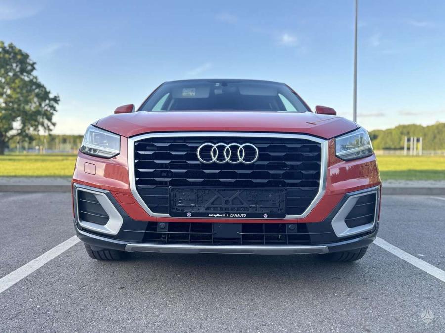 Orange Audi Q2 2017 in Kaunas, with an engine capacity of 1.60 L and mileage of 292 thousand km for 12800 €, photo 4 on AUTOMOTO.COM.LV