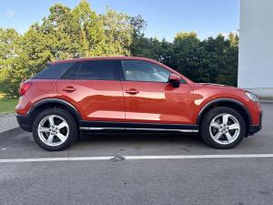 Orange Audi Q2 2017 in Kaunas, with an engine capacity of 1.60 L and mileage of 292 thousand km for 12800 €, photo 6 on AUTOMOTO.COM.LV
