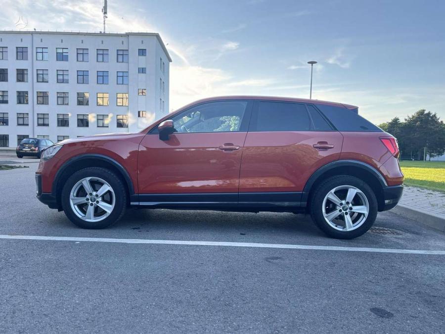 Orange Audi Q2 2017 in Kaunas, with an engine capacity of 1.60 L and mileage of 292 thousand km for 12800 €, photo 7 on AUTOMOTO.COM.LV