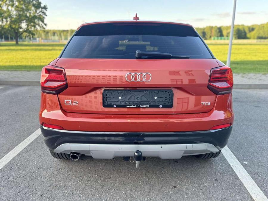 Orange Audi Q2 2017 in Kaunas, with an engine capacity of 1.60 L and mileage of 292 thousand km for 12800 €, photo 9 on AUTOMOTO.COM.LV