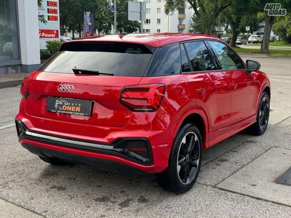 Red Audi Q2 2024 in Kaunas, with an engine capacity of 1.50 L and mileage of 18 thousand km for 32082 €, photo 8 on AUTOMOTO.COM.LV