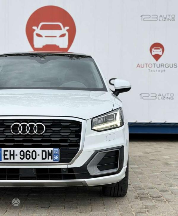 White Audi Q2 2016 in Taurage, with an engine capacity of 1.60 L and mileage of 158 thousand km for 11800 €, photo 6 on AUTOMOTO.COM.LV